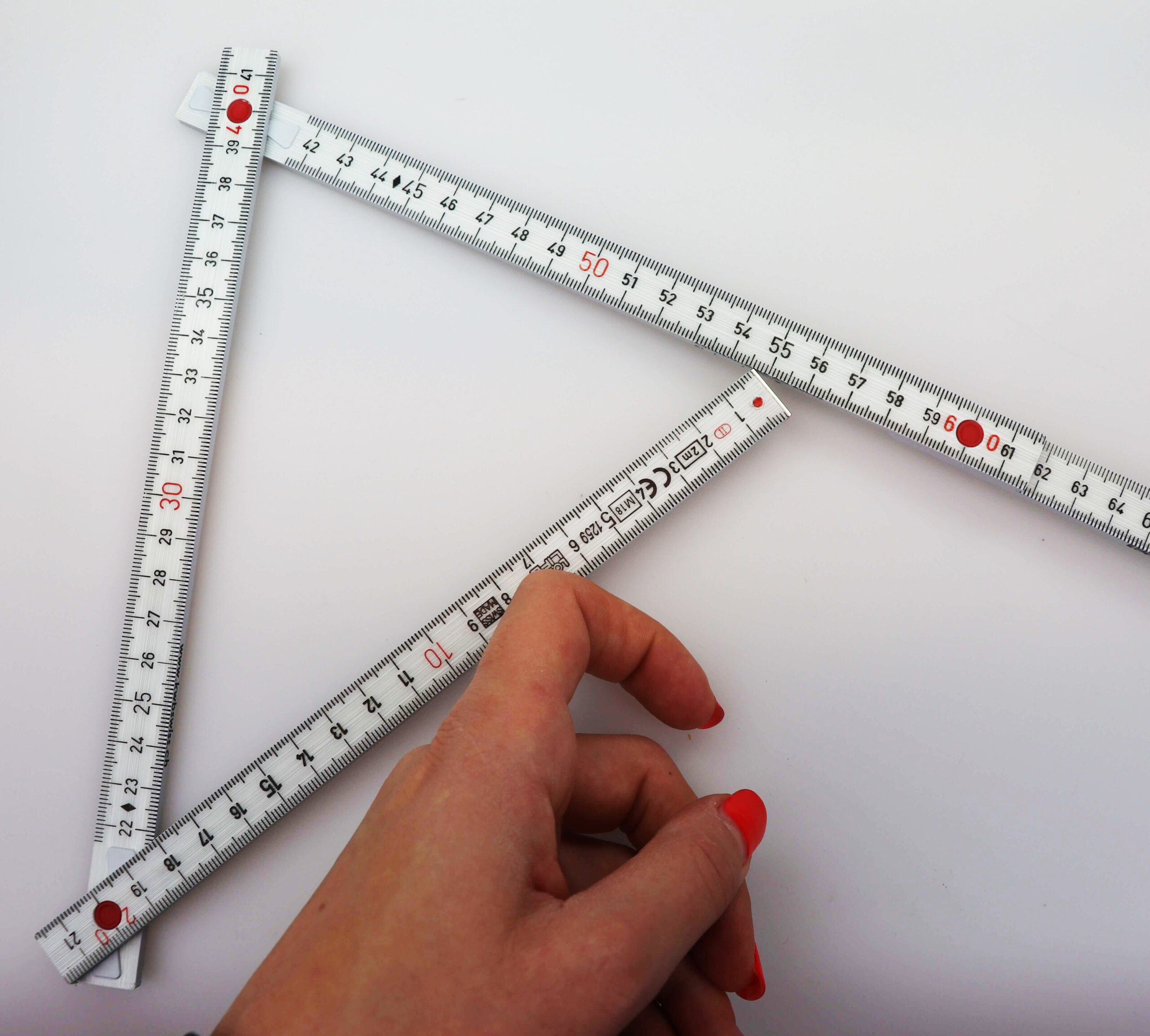 Measuring angles with a folding ruler - Kunststoffwerk AG Buchs